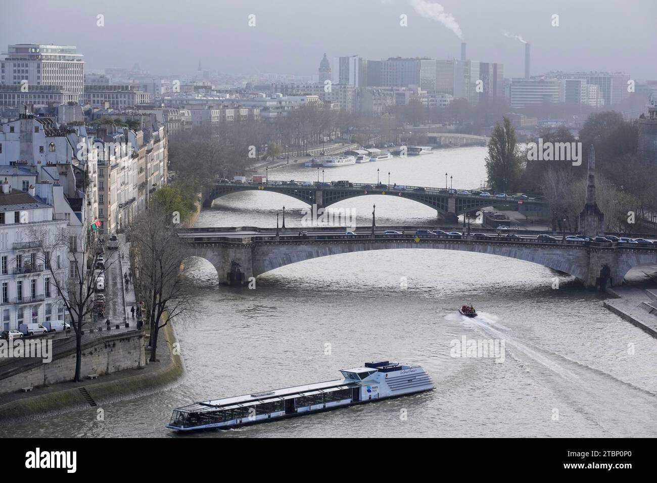 A barge makes its way pictured from Notre Dame de Paris cathedral ...