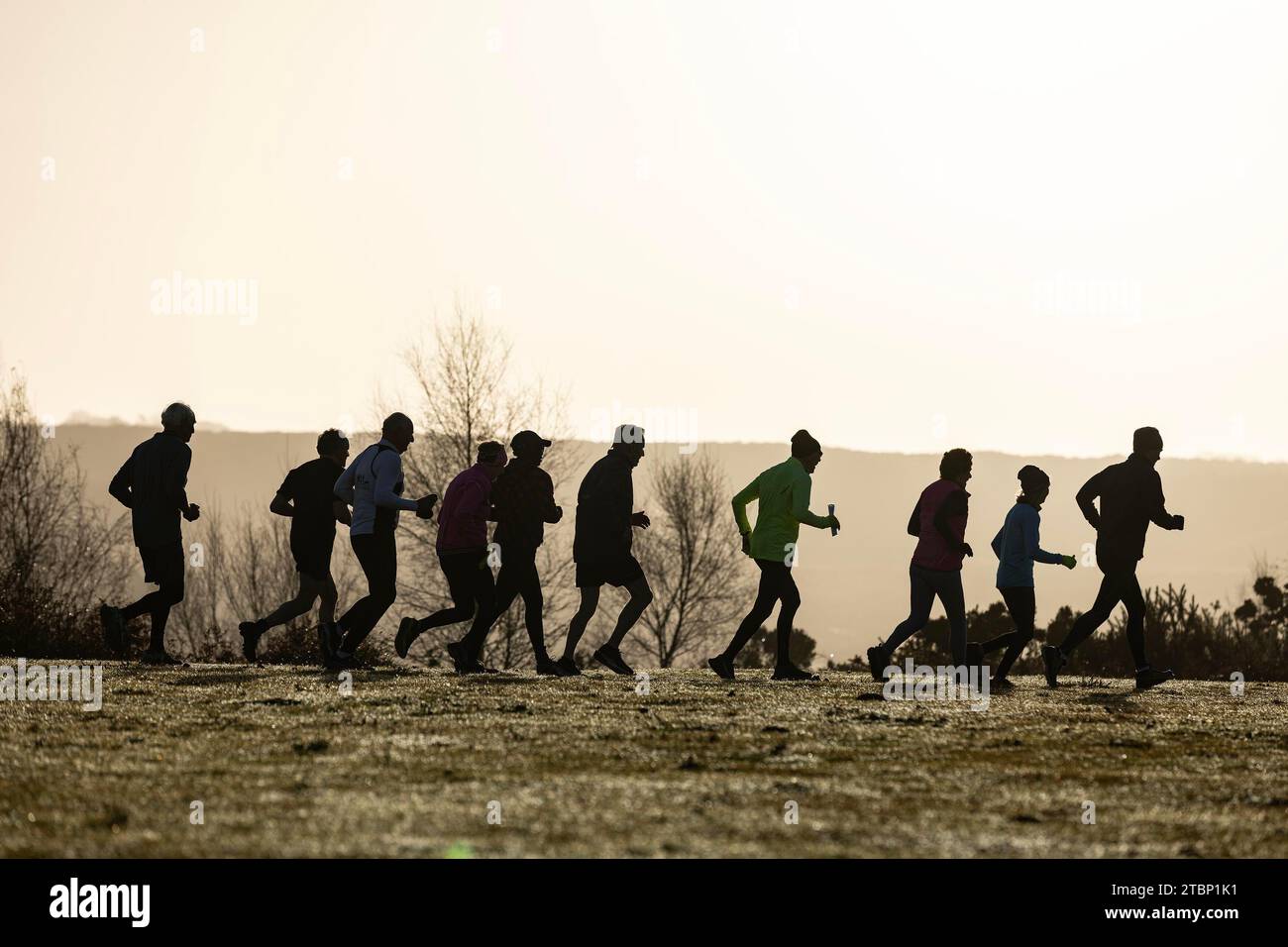 Early morning runners enjoy the crisp December weather on Godshill in ...