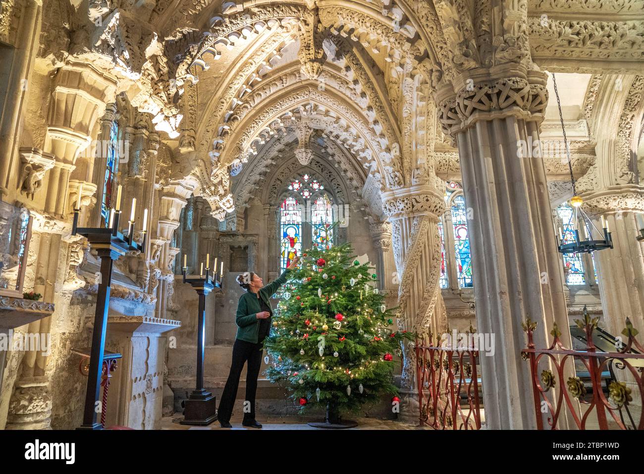 Lorraine Costello puts the finishing touches to the Christmas tree in ...