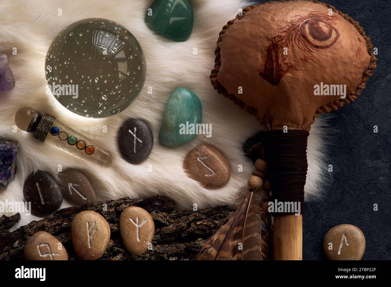 handmade stone runes on white fur Stock Photo - Alamy