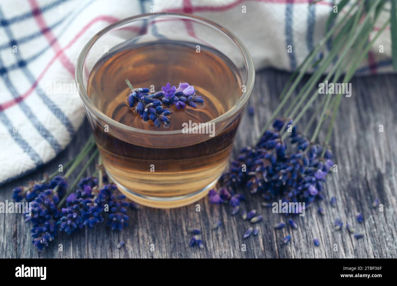 Lavender tea with flowers in natural surface Stock Photo - Alamy