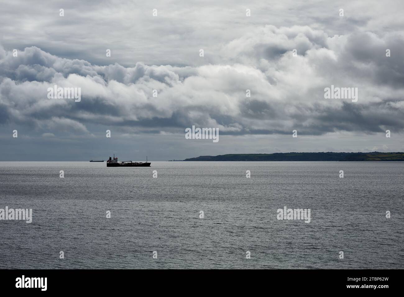 Ship behind the rocks hi-res stock photography and images - Alamy