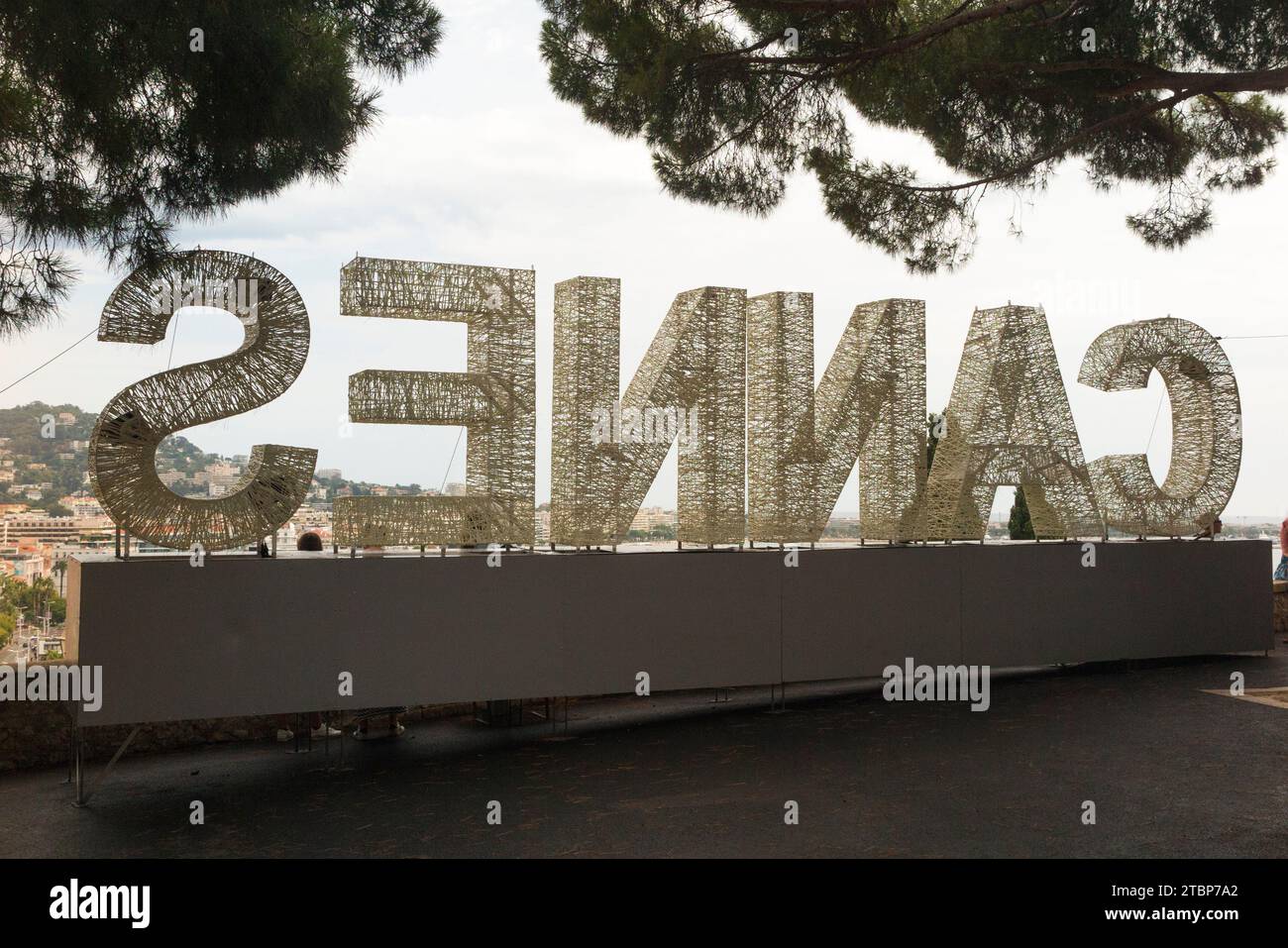 Large letters spell the word Cannes, sign overlooking town from Place ...