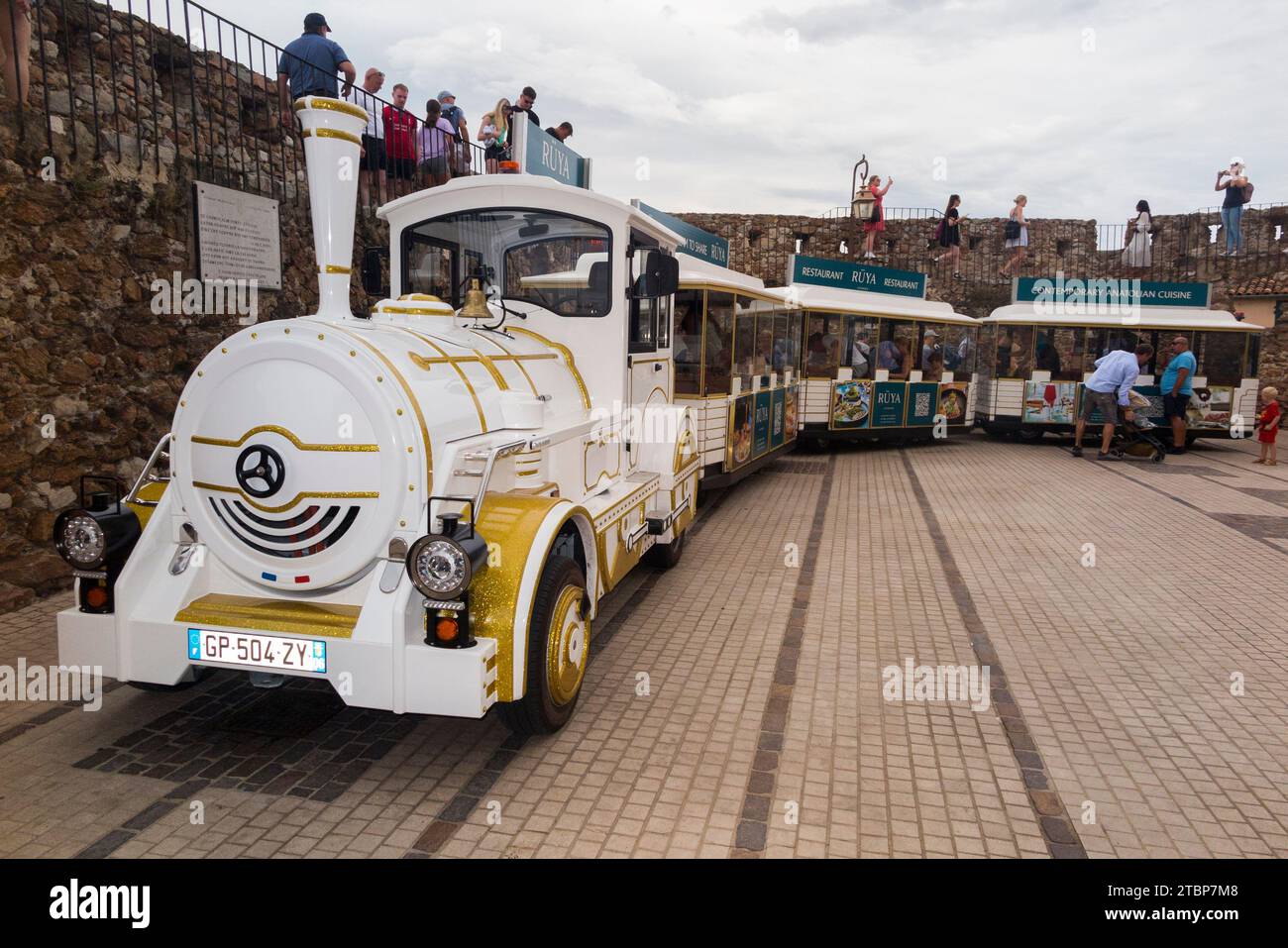 Tourist sightseeing train / trains with visitors enjoying tour of ...