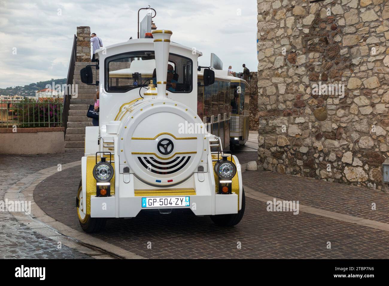 Tourist sightseeing train / trains with visitors enjoying tour of ...