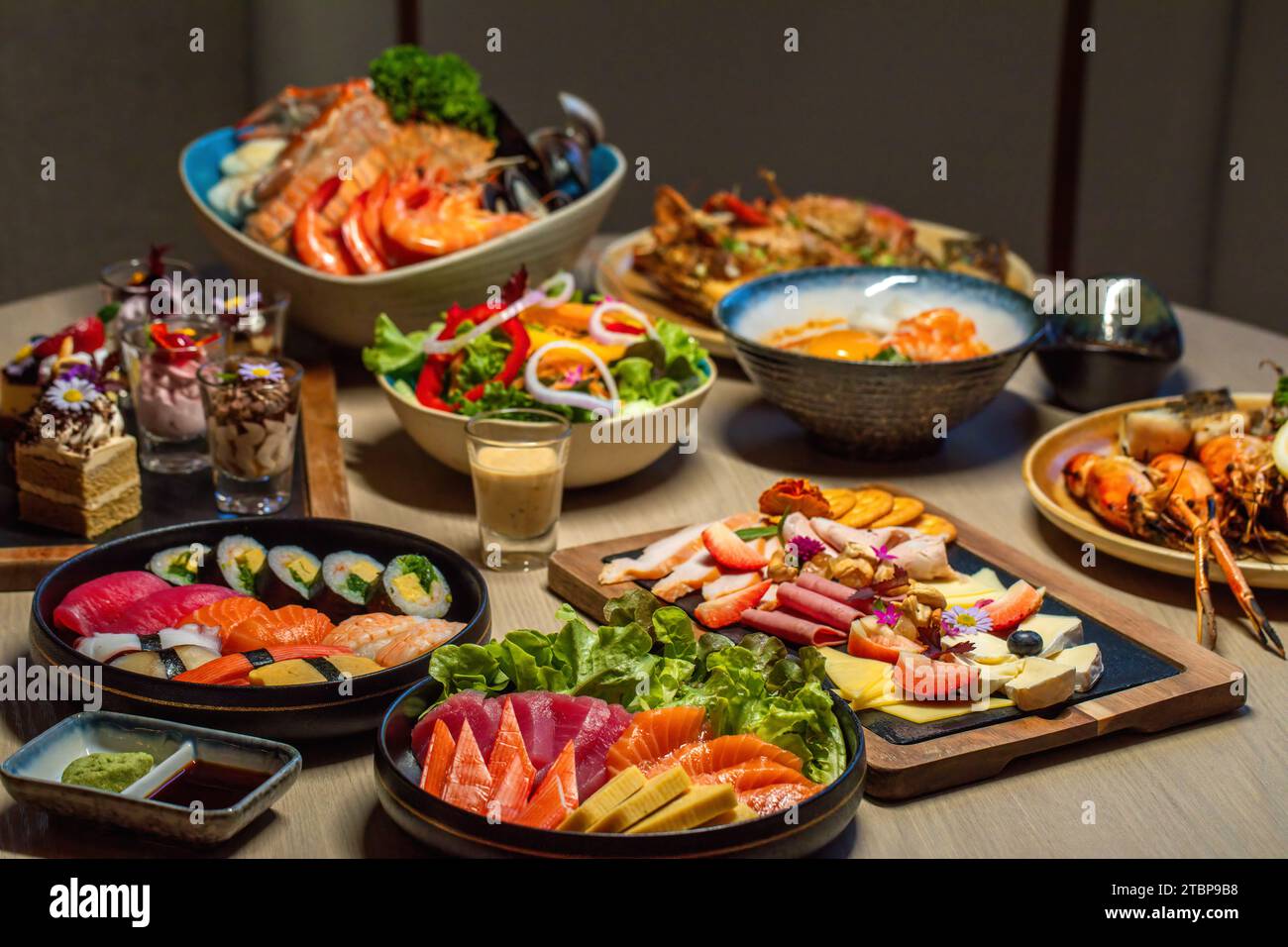 Assorted healthy seafood and vegetables spread on dining table. Gourmet ...