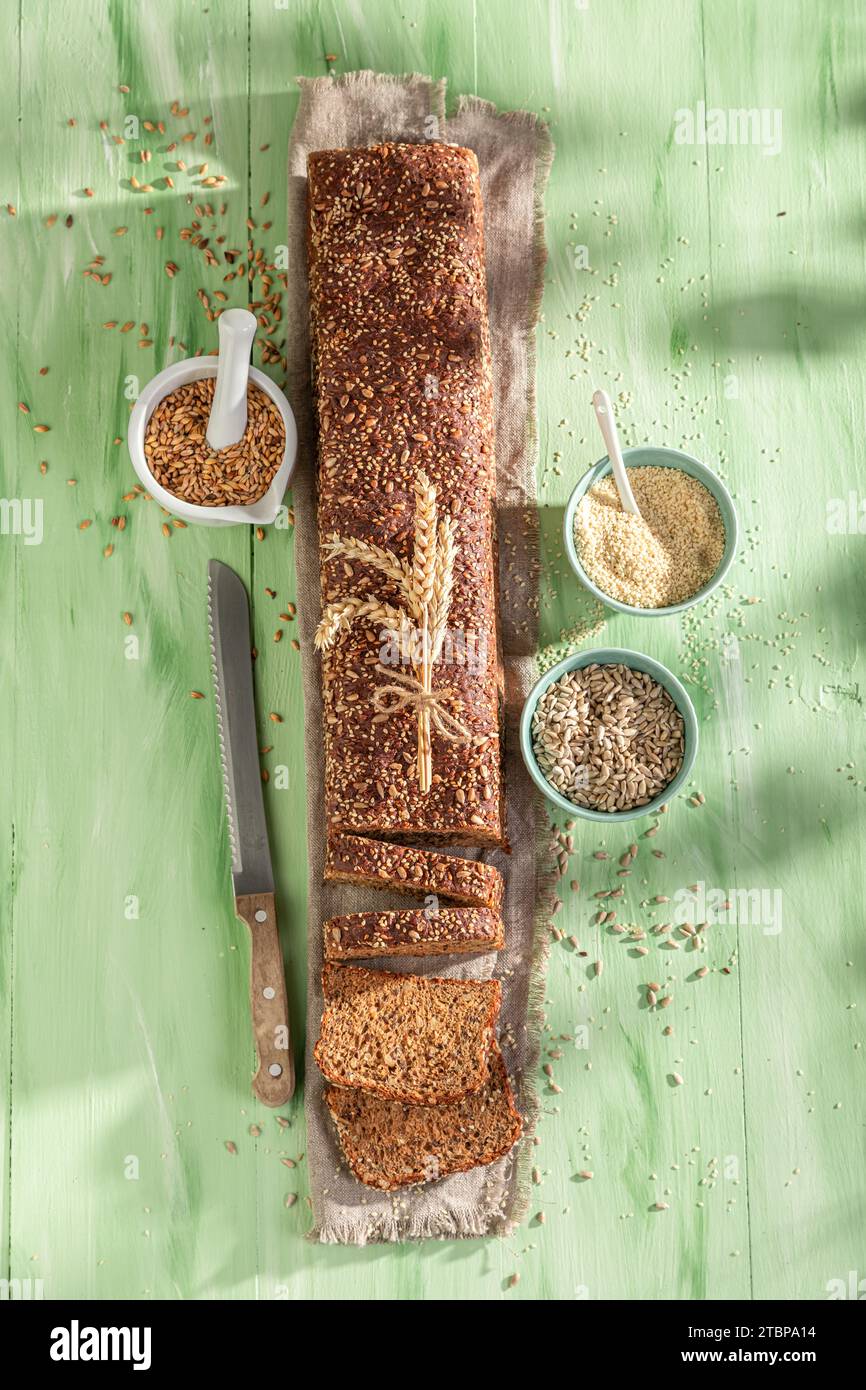 Fresh loaf of wholemeal bread as source of fiber. Dark bread with ...