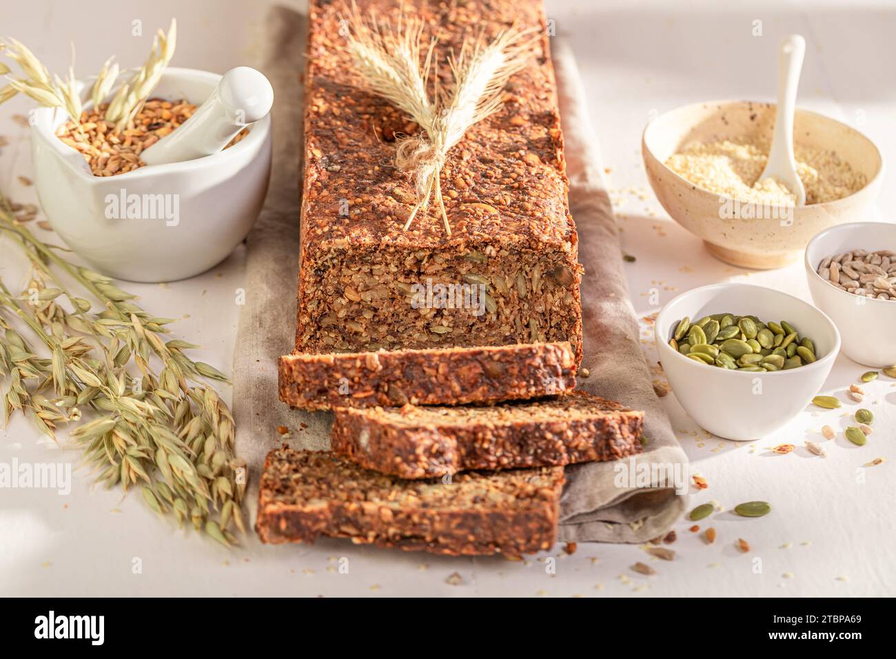 Multigrain loaf of wholemeal bread freshly baked in home bakery ...