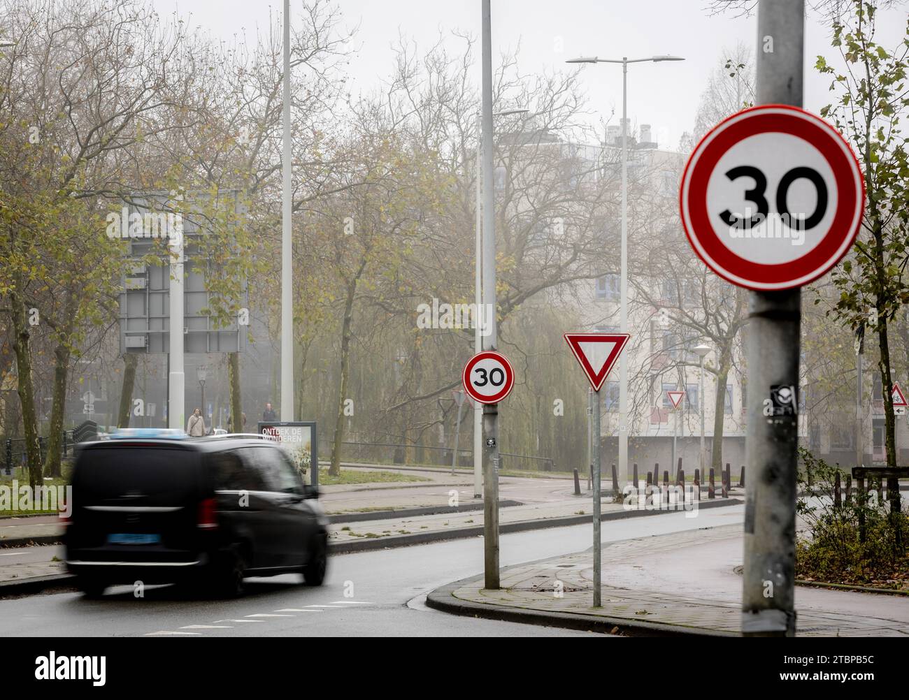 AMSTERDAM - Traffic signs for 30 km per hour at the Mauritskade. In ...