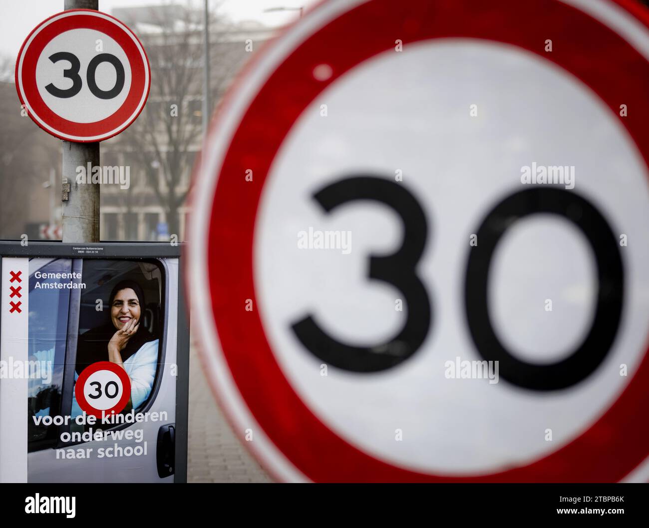 AMSTERDAM - Traffic signs for 30 km per hour at the Mauritskade. In ...