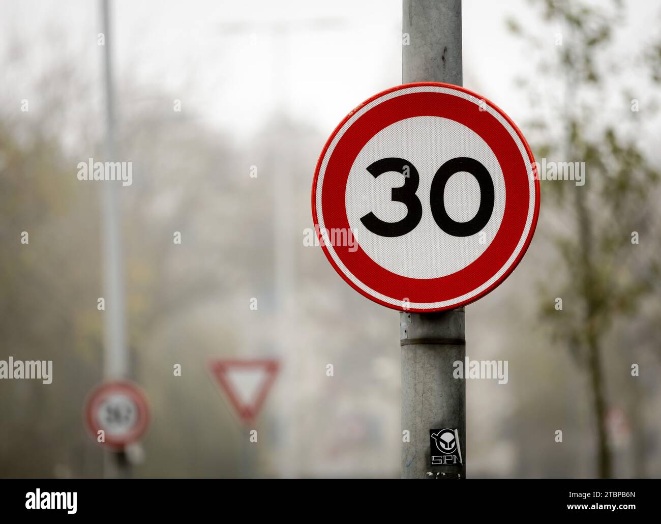 AMSTERDAM - Traffic signs for 30 km per hour at the Mauritskade. In ...