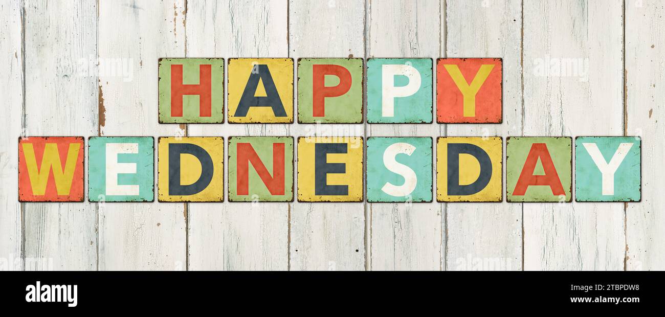 Colorful tin signs - Happy Wednesday Stock Photo - Alamy