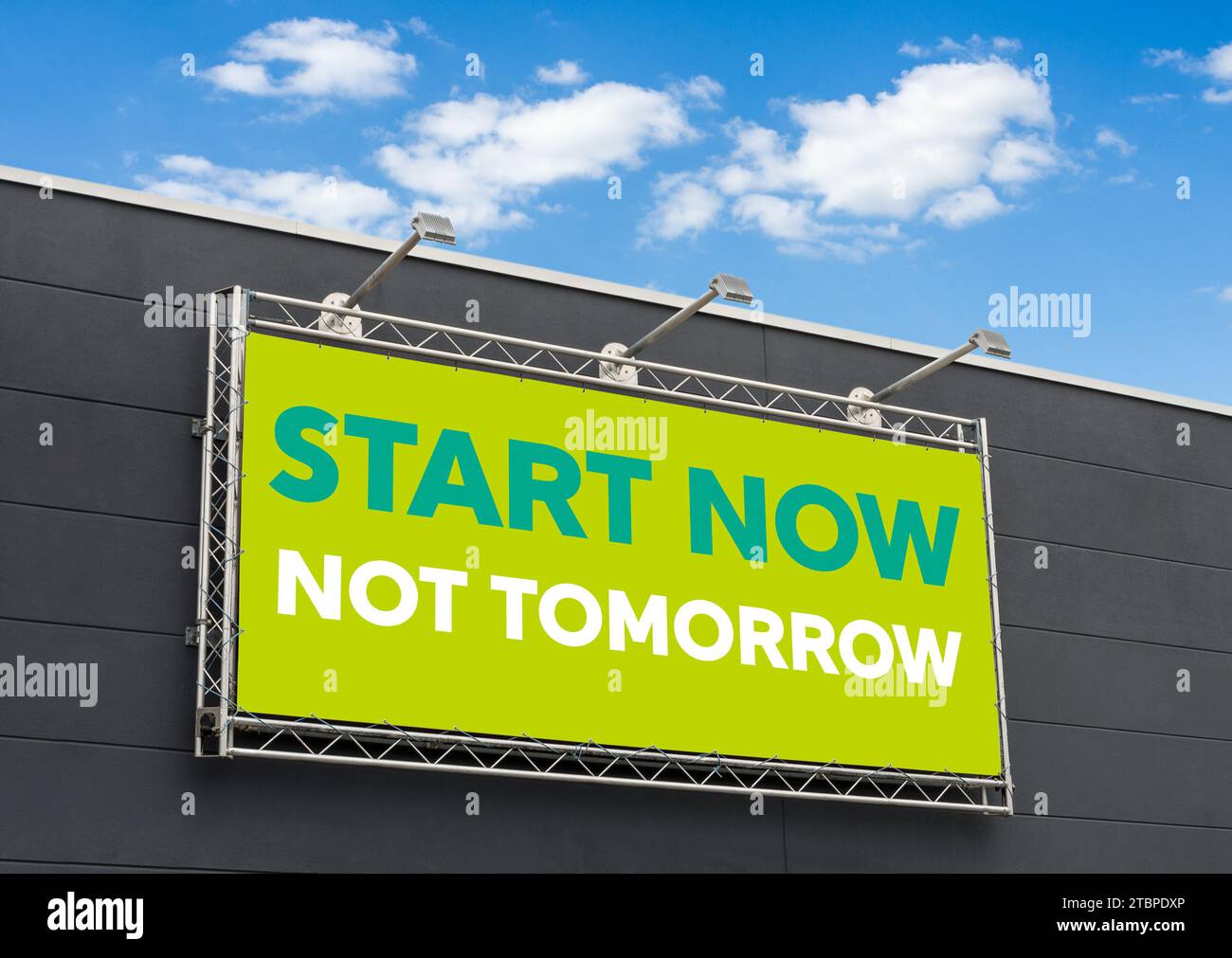 Start now not tomorrow written on a billboard Stock Photo - Alamy