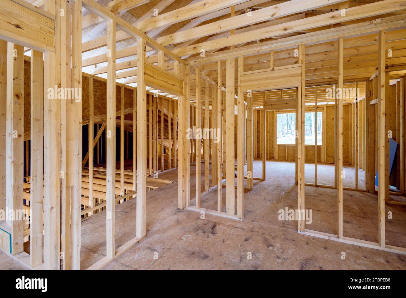 View interior of new house under construction showing incomplete wood ...