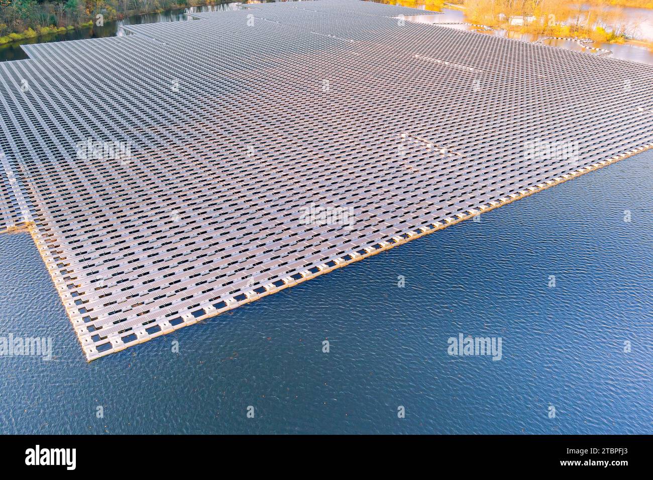 Solar panels are floating in large water pond are being used to ...