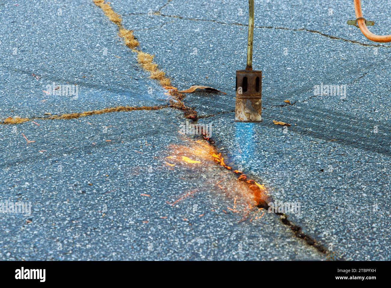 Burning asphalt hi-res stock photography and images - Alamy