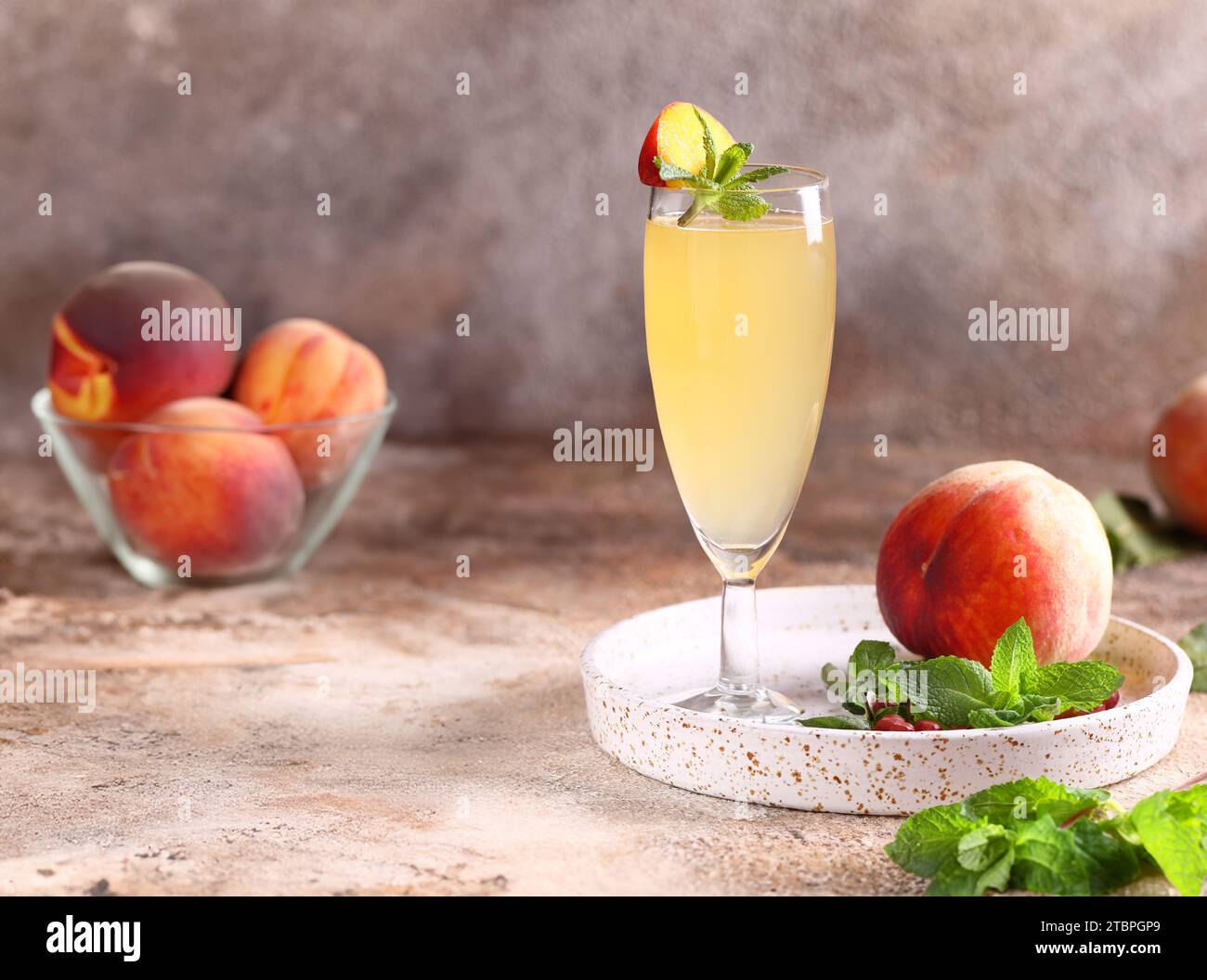 traditional drink with peaches bellini Stock Photo - Alamy