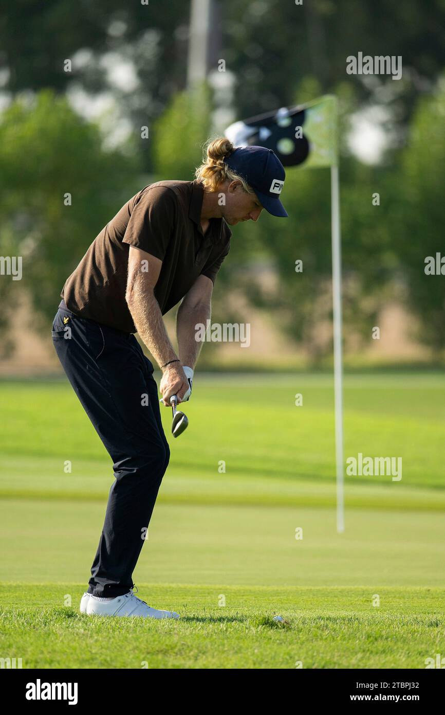 Travis Smyth of Australia chips onto the 18th hole during the first ...