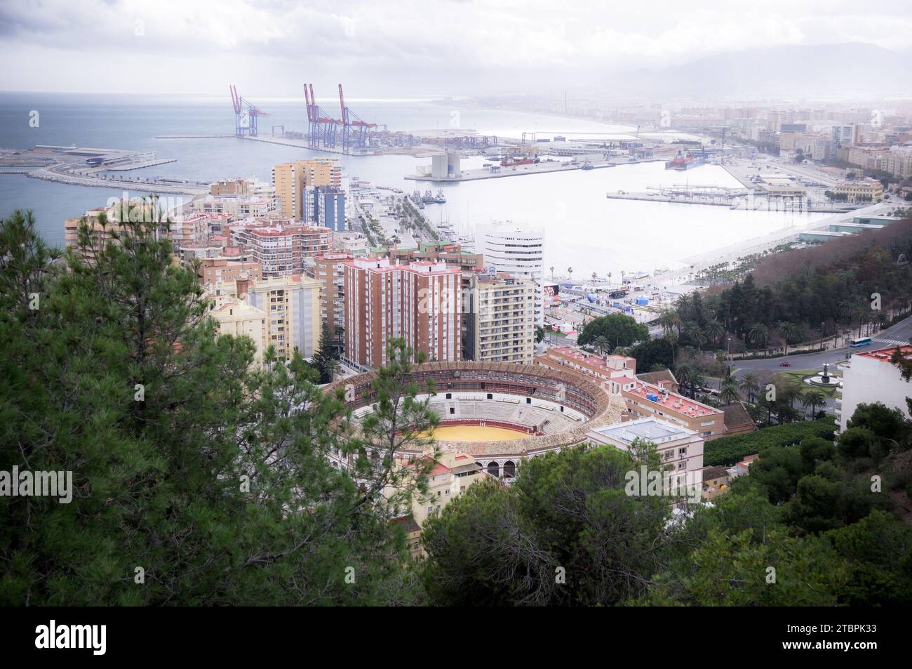 Aerial view of a bustling cityscape, featuring a winding river with ...