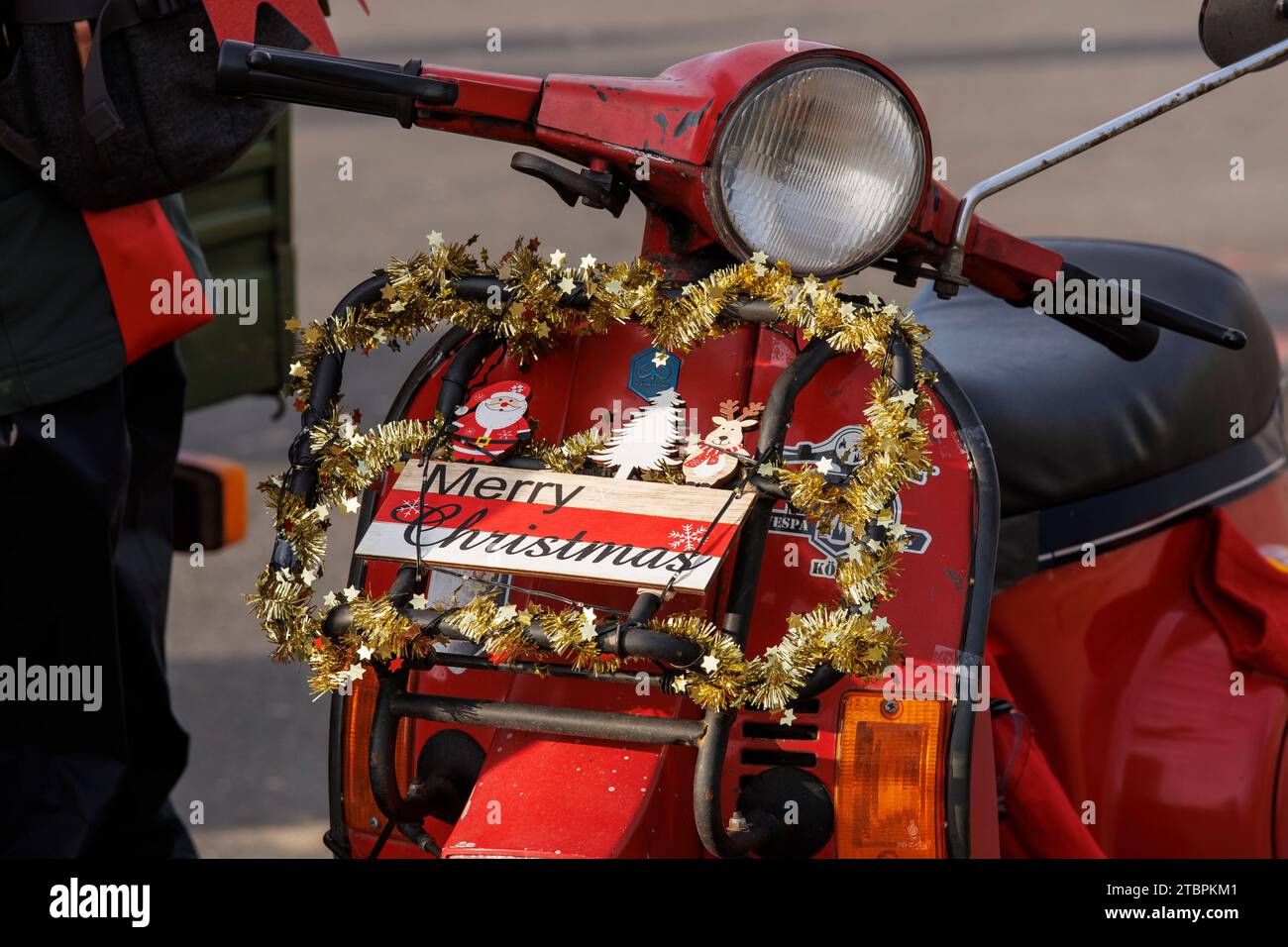 Christmas decorated Vespa scooter, members of the Vespa scooter club ...