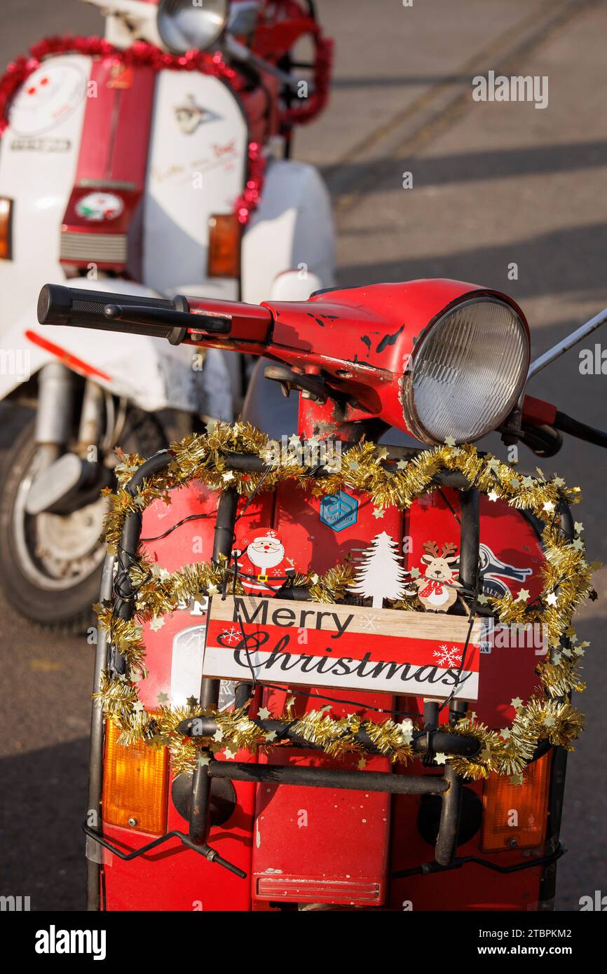 Christmas decorated Vespa scooter, members of the Vespa scooter club ...
