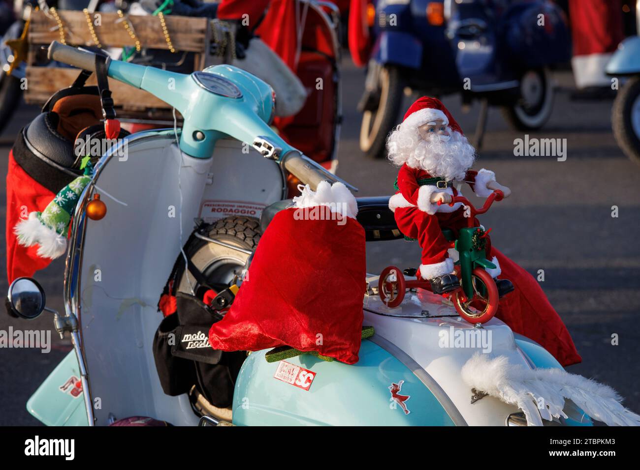 Christmas decorated Vespa scooter, members of the Vespa scooter club ...