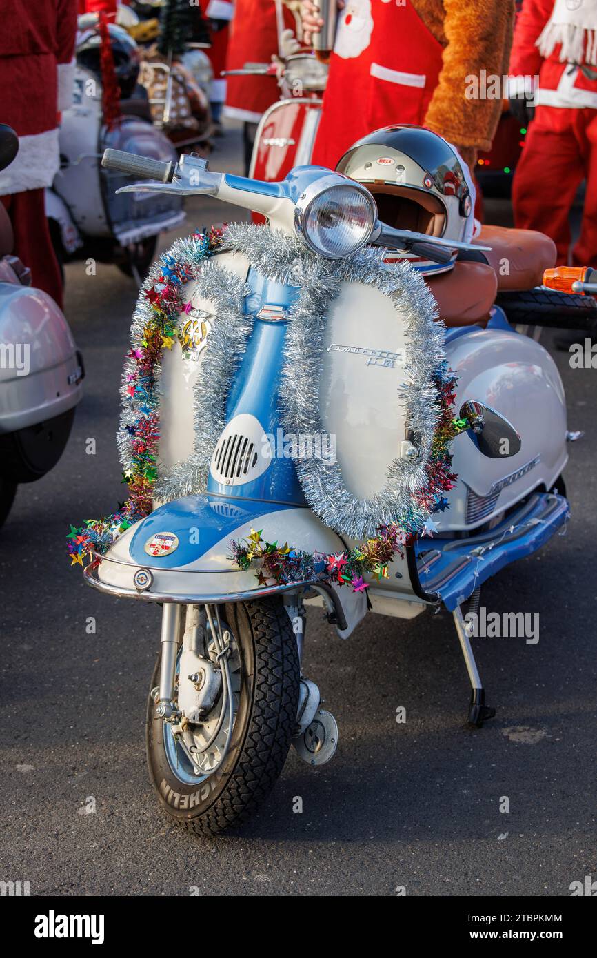 Christmas decorated Lambretta scooter, members of the Vespa scooter ...