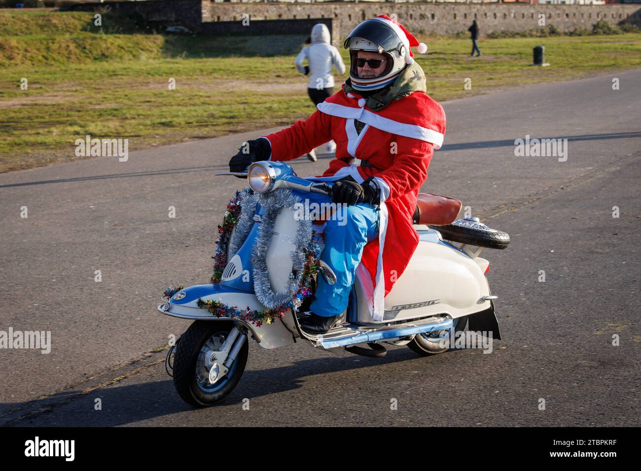 Christmas decorated Lambretta scooter, members of the Vespa scooter ...