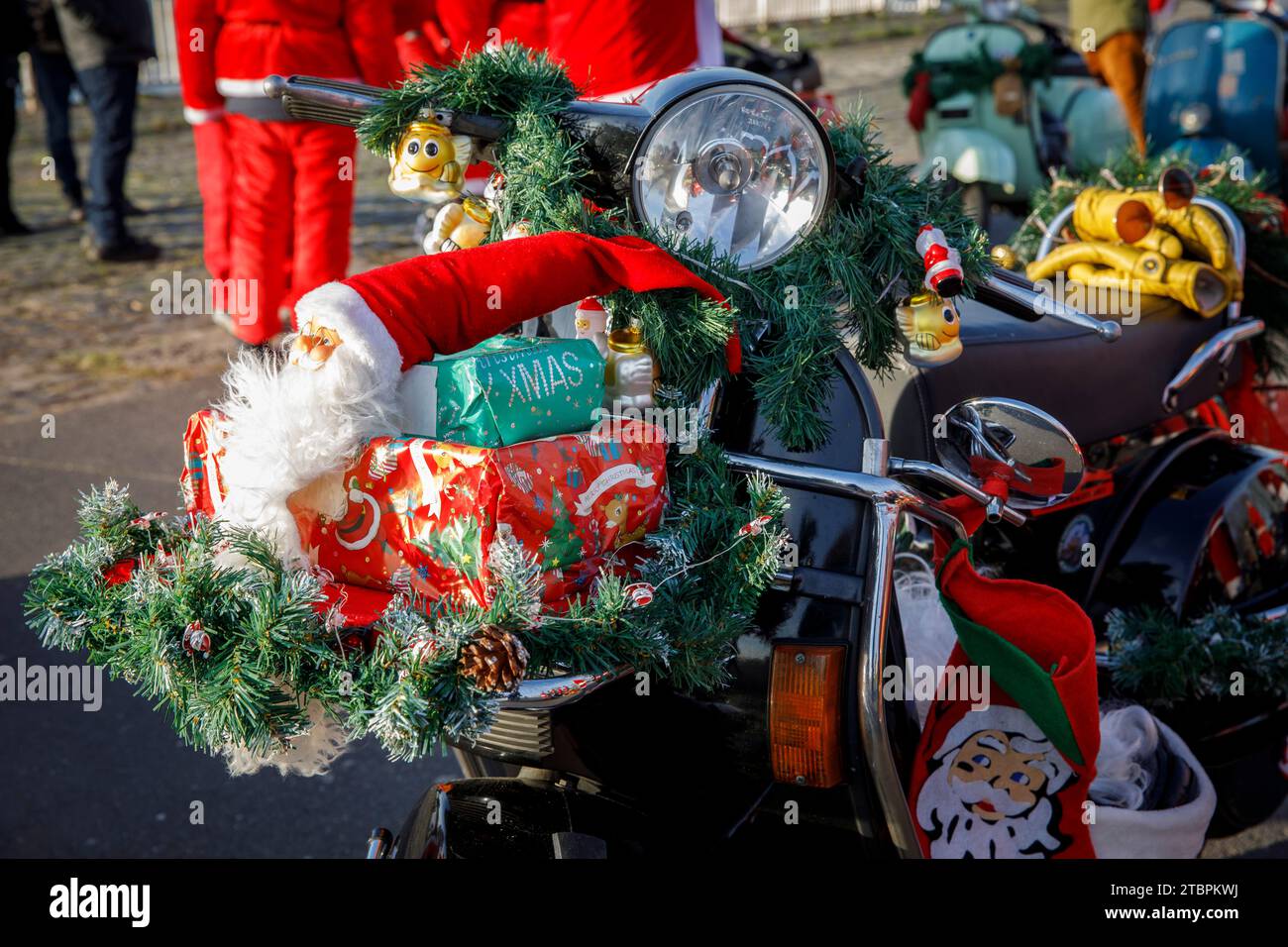 Christmas decorated Vespa scooter, members of the Vespa scooter club ...