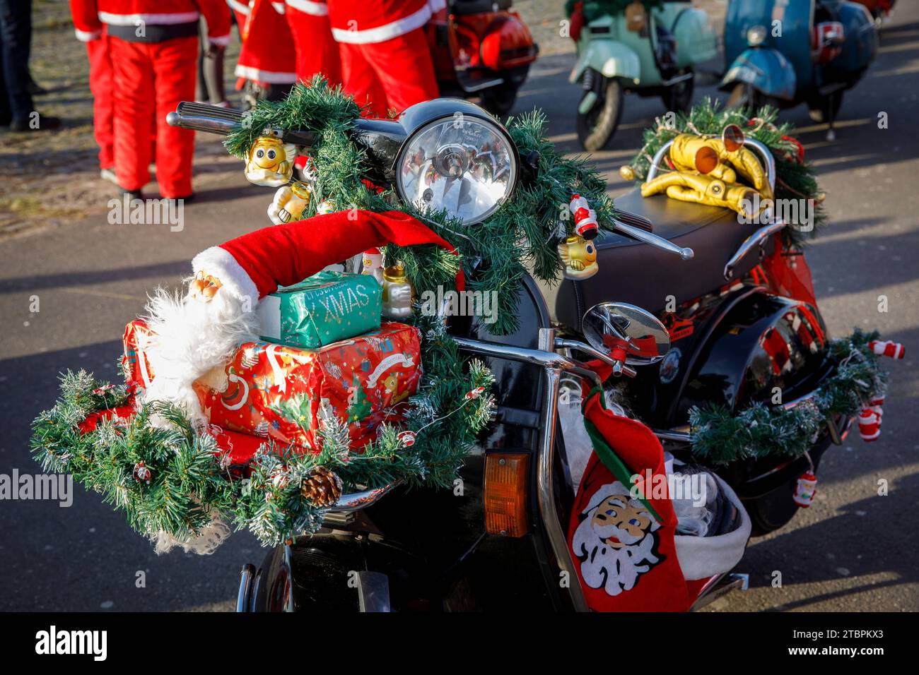 Christmas decorated Vespa scooter, members of the Vespa scooter club ...