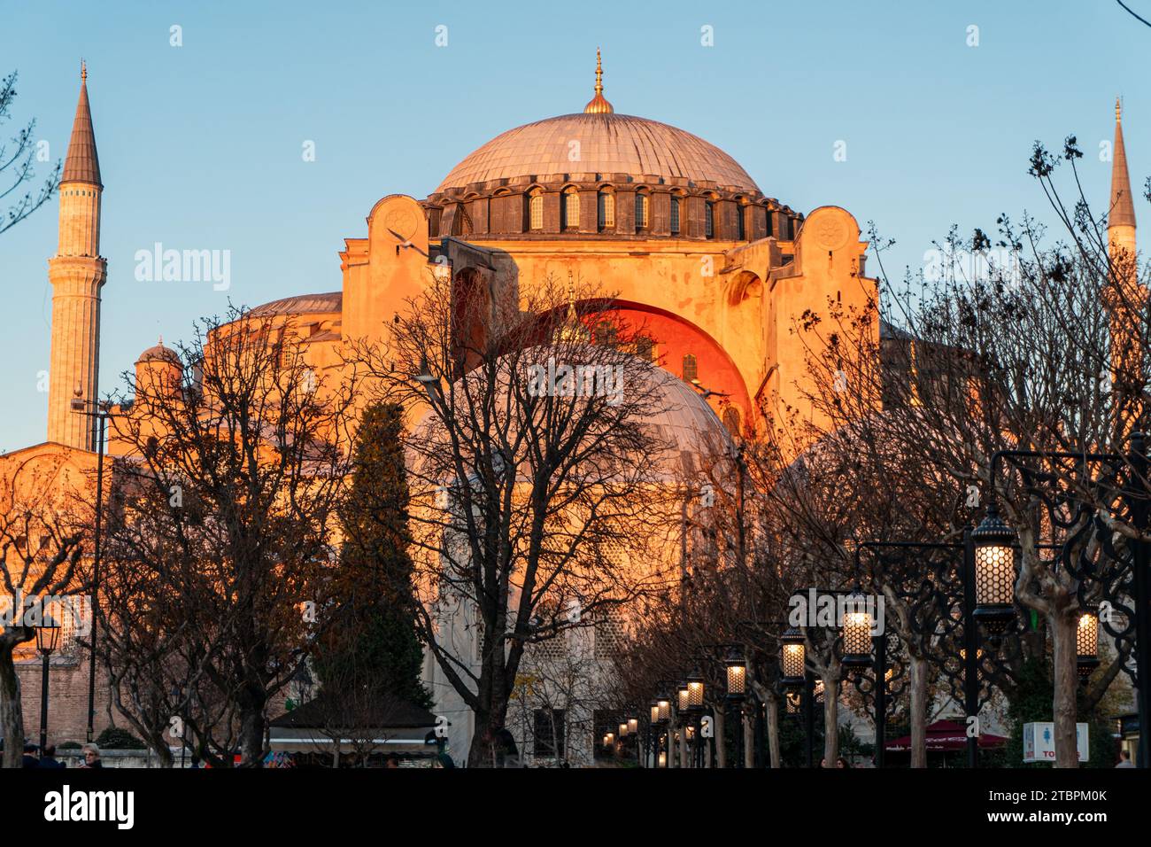 An aerial view of a majestic building with three impressive towers ...