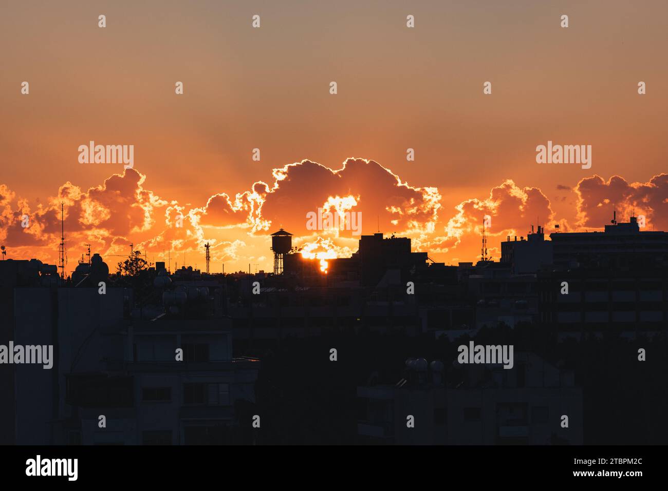 A stunning sunset illuminating buildings in Limassol, Cyprus Stock ...