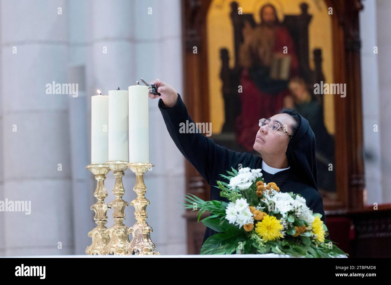 A nun during the Eucharist of the Immaculate Conception at the Almudena ...
