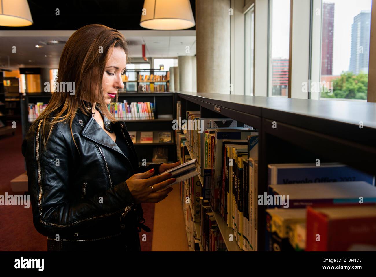 Rotterdam, Netherlands. Young, brunette and caucasian immigrant girl from the Ukraine, visiting ...