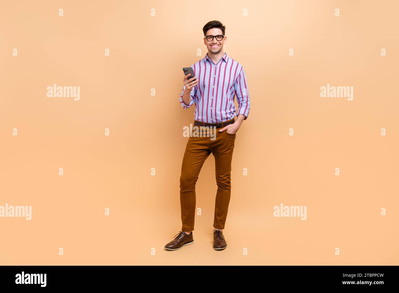 Full length photo of handsome man dressed stylish clothes hold modern ...