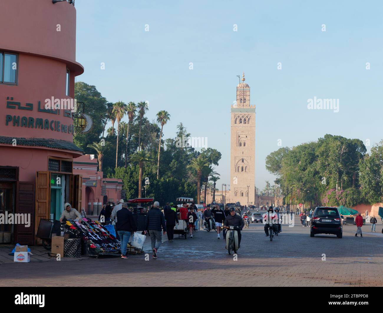 Busy street with Koutoubia Mosque behind in Marrakesh aka Marrakech ...