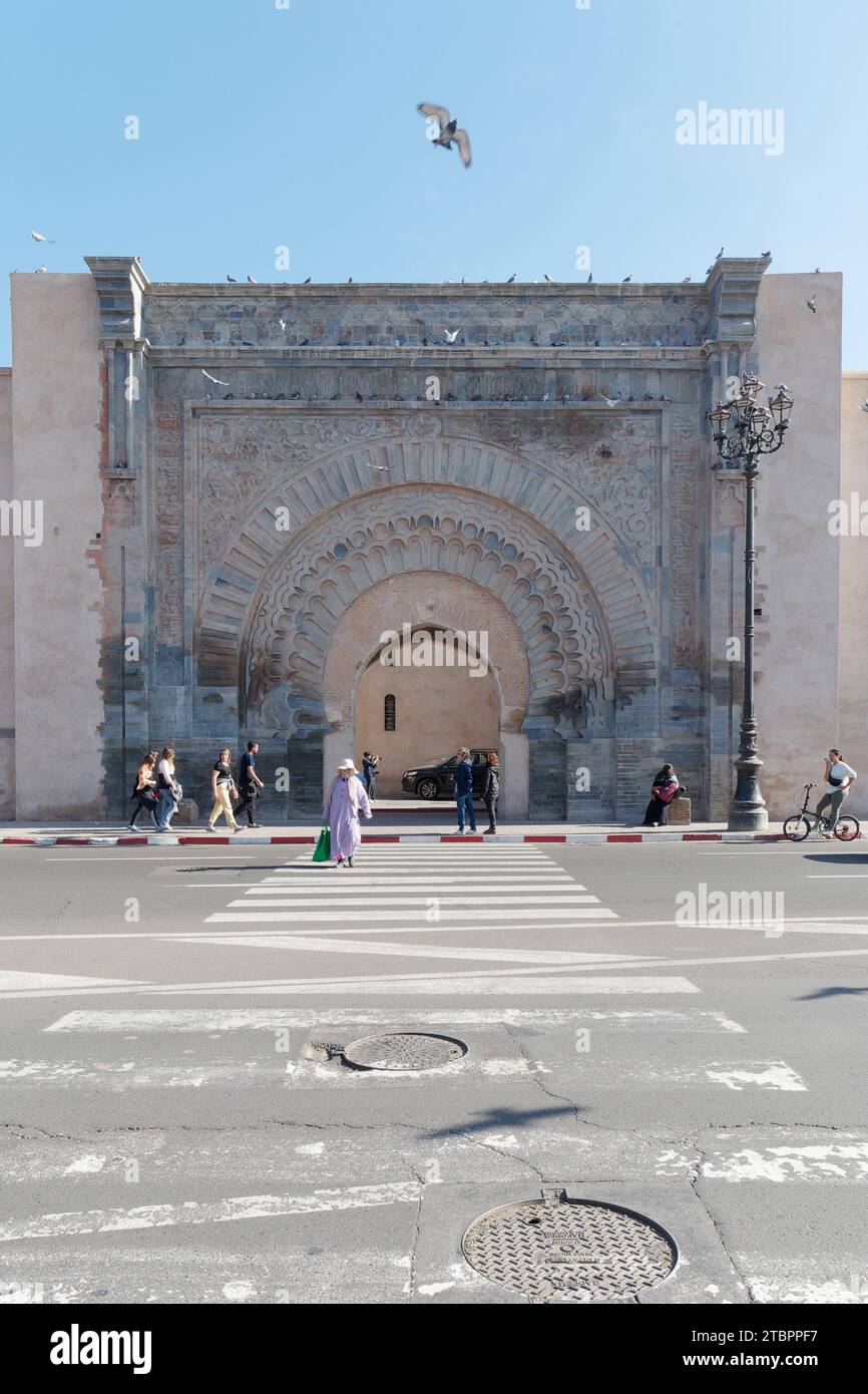 Pedestrians crossing a road in front of Bab Agnaou (Gate Agnaou) in ...