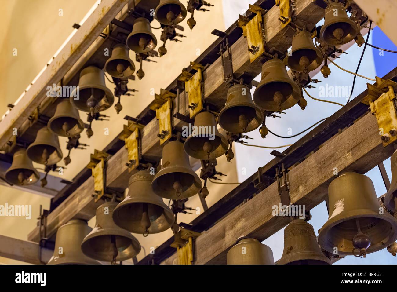 Church bells of multiple sizes installed in the bell tower Stock Photo ...