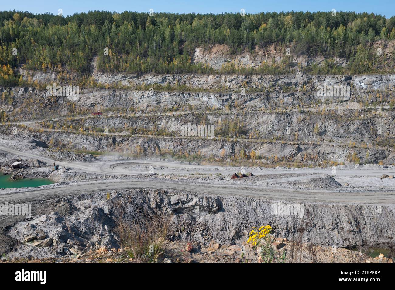 The production of graphite. Industrial background. Deep quarry for the ...