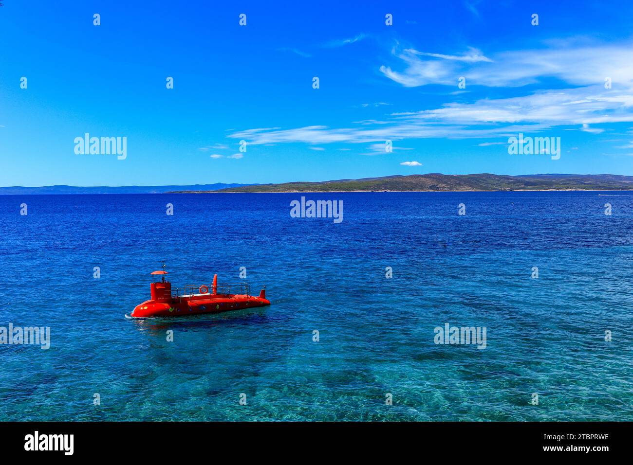Red submarine against the background of the Adriatic Sea tourist ...