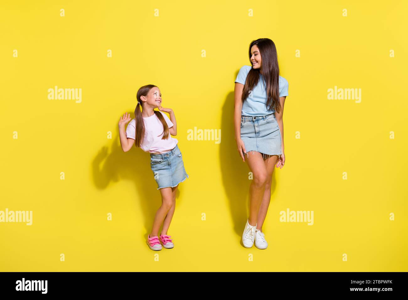 Photo of two cute girls sisters on family meeting events dancing ...