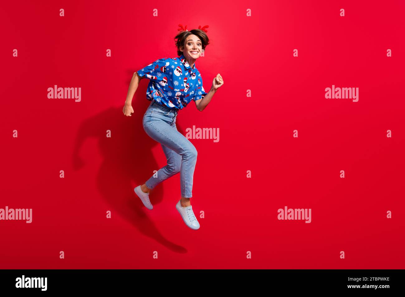 Full body photo of jump run hurry up charming girl santa claus shirt ...