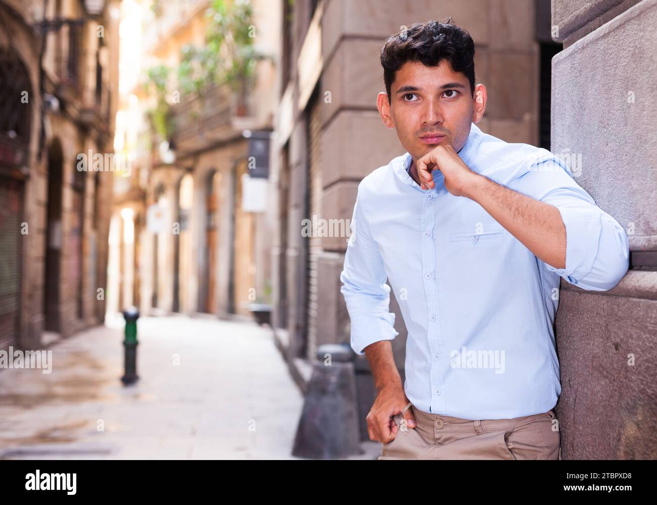 Man posing in gothic quarter of Barcelona Stock Photo - Alamy