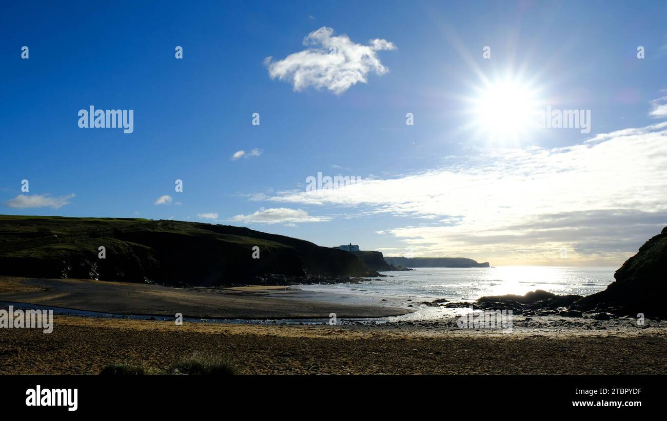 Setting sun at Church Cove, Gunwalloe on the Lizard Peninsula, Cornwall ...