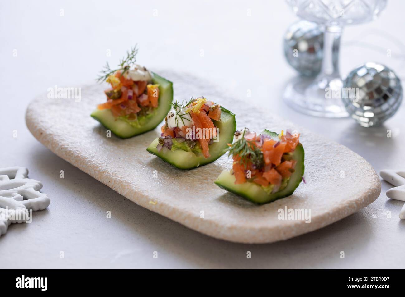 Cucumber and salmon Christmas canapes Stock Photo - Alamy