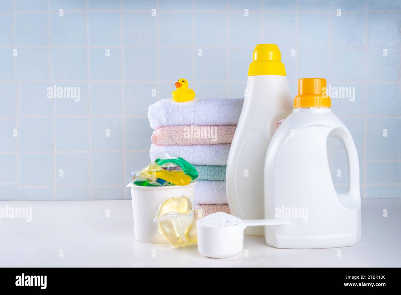 Laundry, washing and cleaning concept. Stack of clean towels, with ...