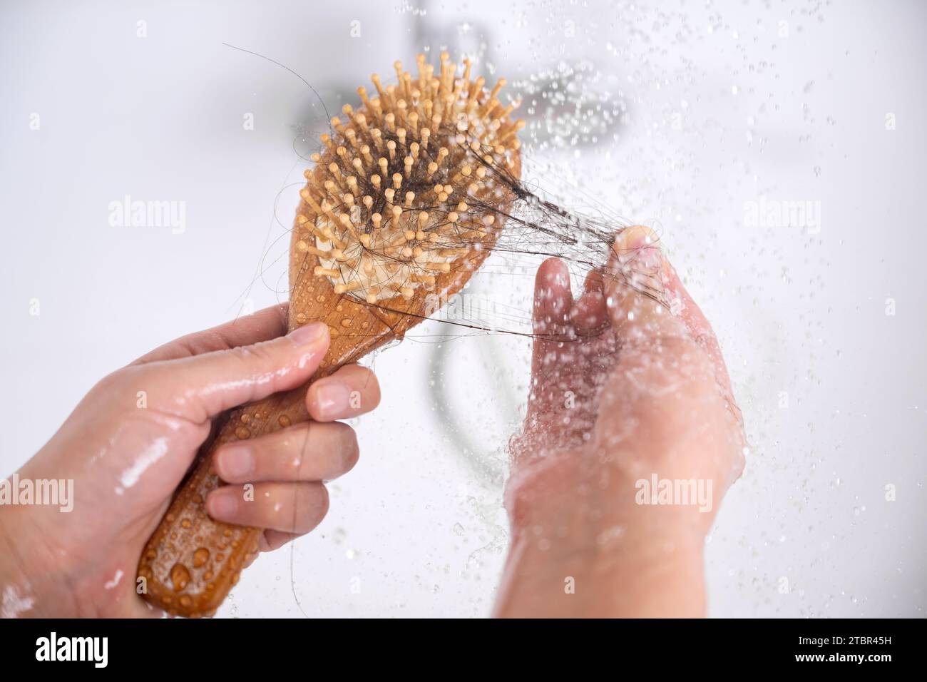 Woman taking a shower hi-res stock photography and images - Alamy