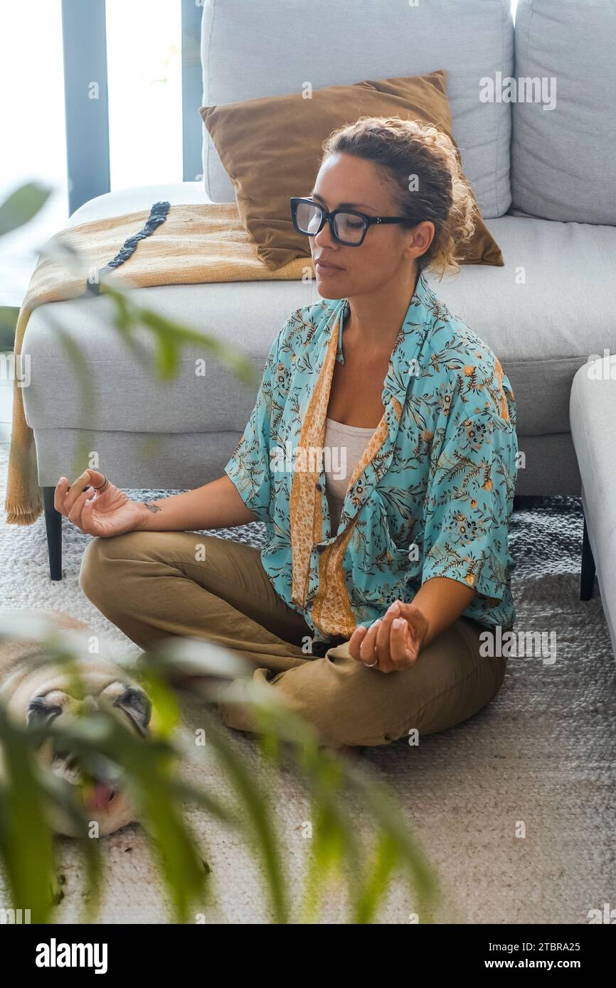 One woman at home having relax and meditation leisure oriental zen ...