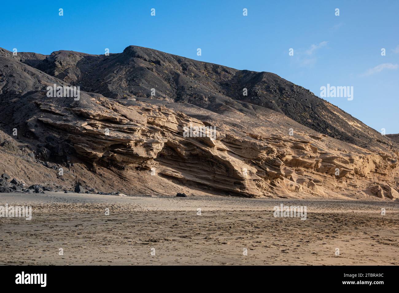 Ventifact rock formations caused by wind at La Pared Beach ...