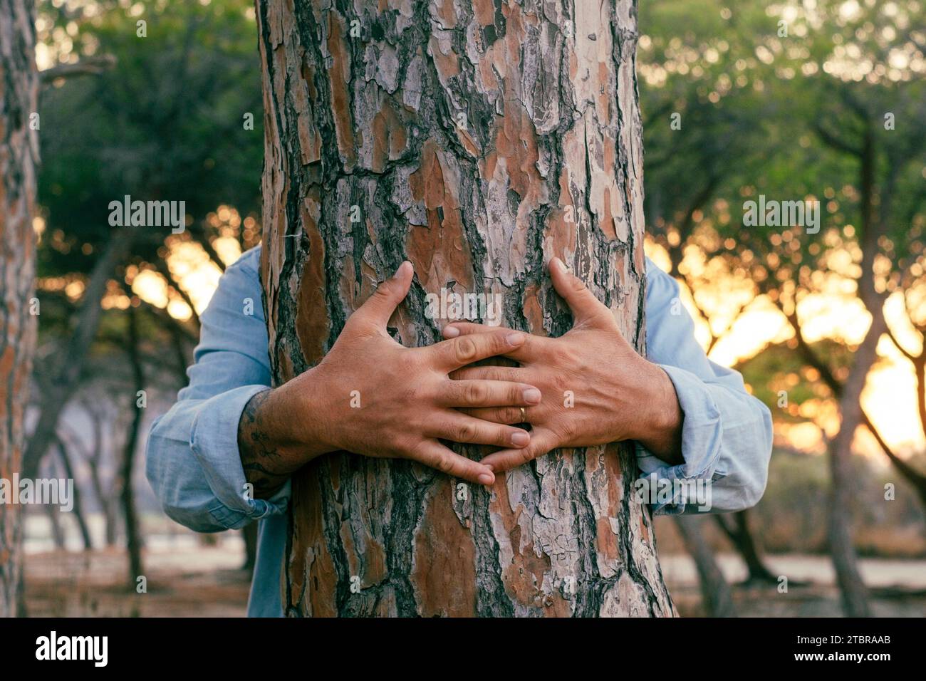 People hugging the earth hi-res stock photography and images - Alamy
